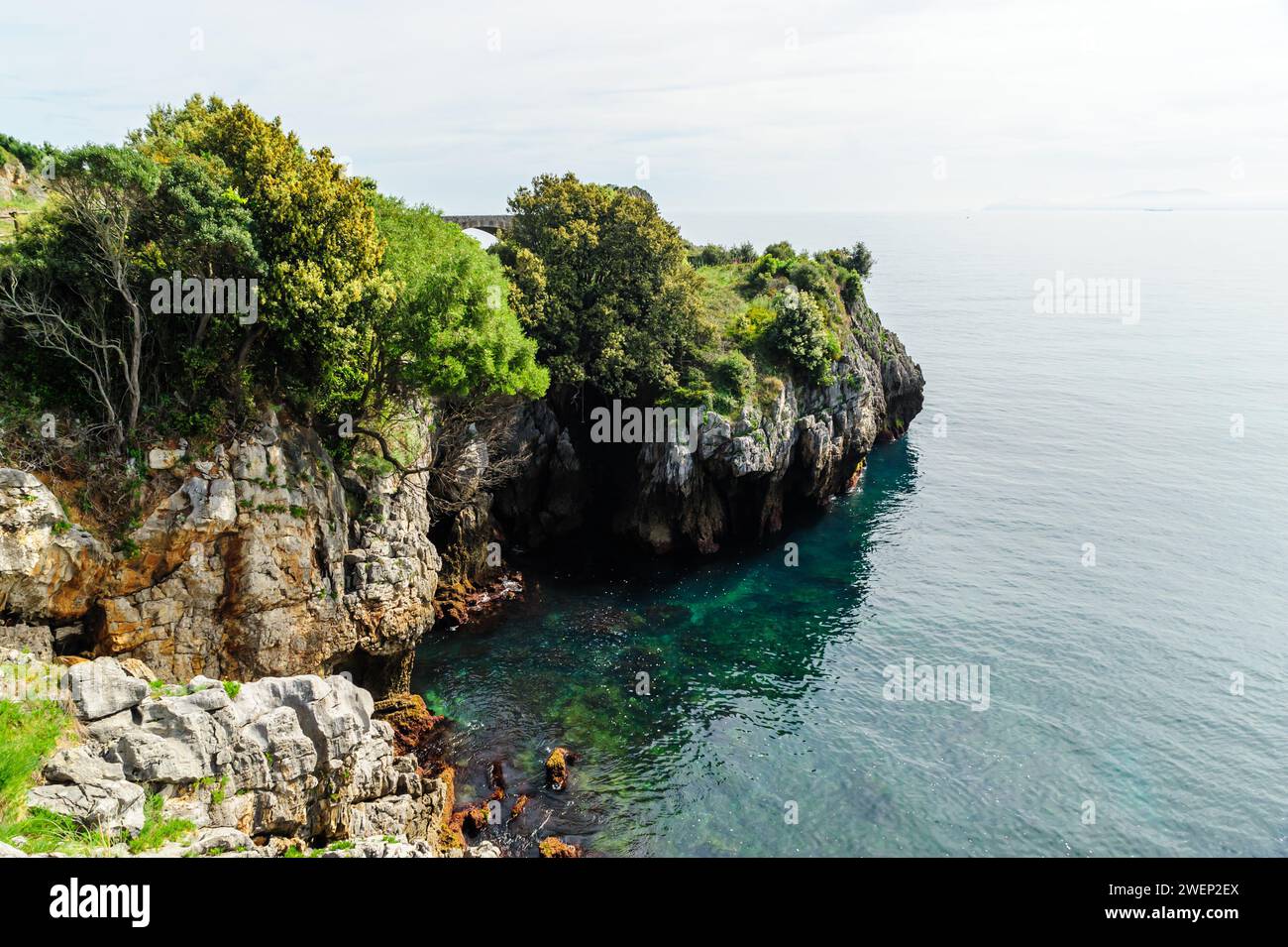 Striking layered rock formations along the rugged coast of Northern ...