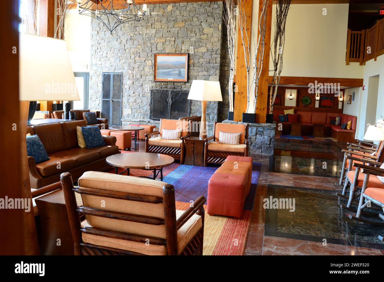 The rustic and chic lobby offers a relaxing location at the mountain ...
