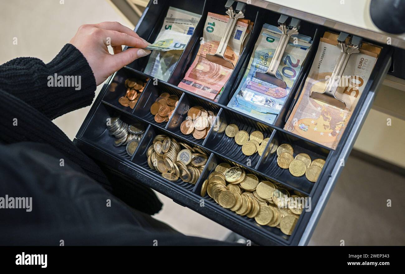 Berlin, Germany. 12th Jan, 2024. Cash is in the till at the Ryf of ...