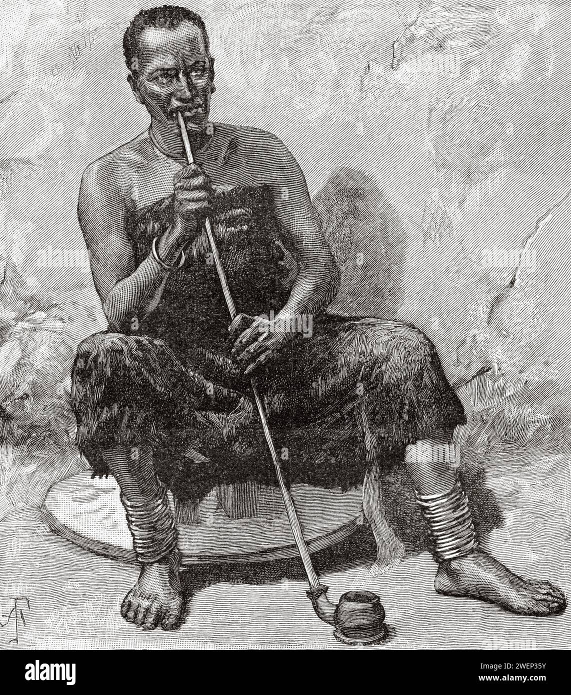 Chief of the Kavalli tribe smoking a long pipe. Africa. Emin Pasha ...
