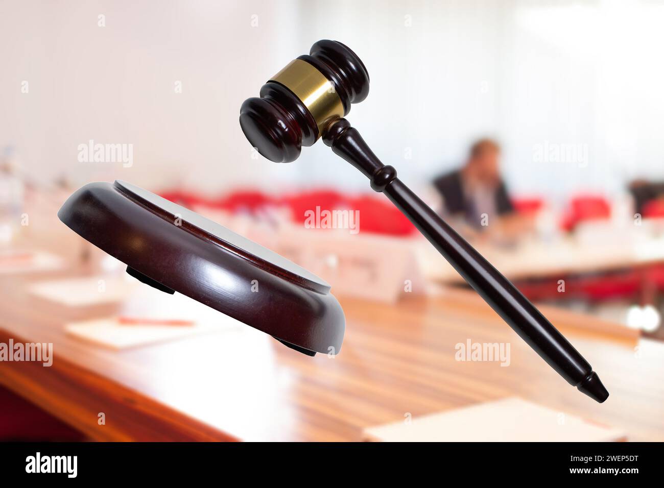 justice gavel and block with courtroom faded background Stock Photo - Alamy