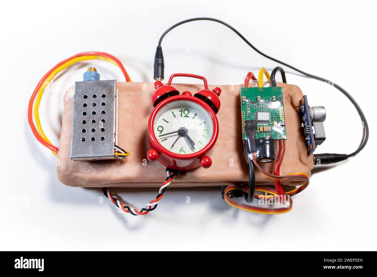 home made time bomb on white background Stock Photo - Alamy