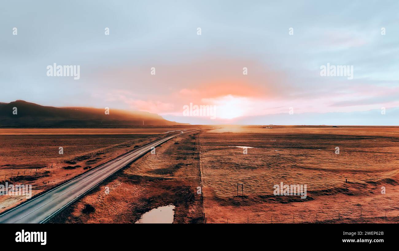 A lone vehicle journeys along a desolate road, leading to an uncertain ...