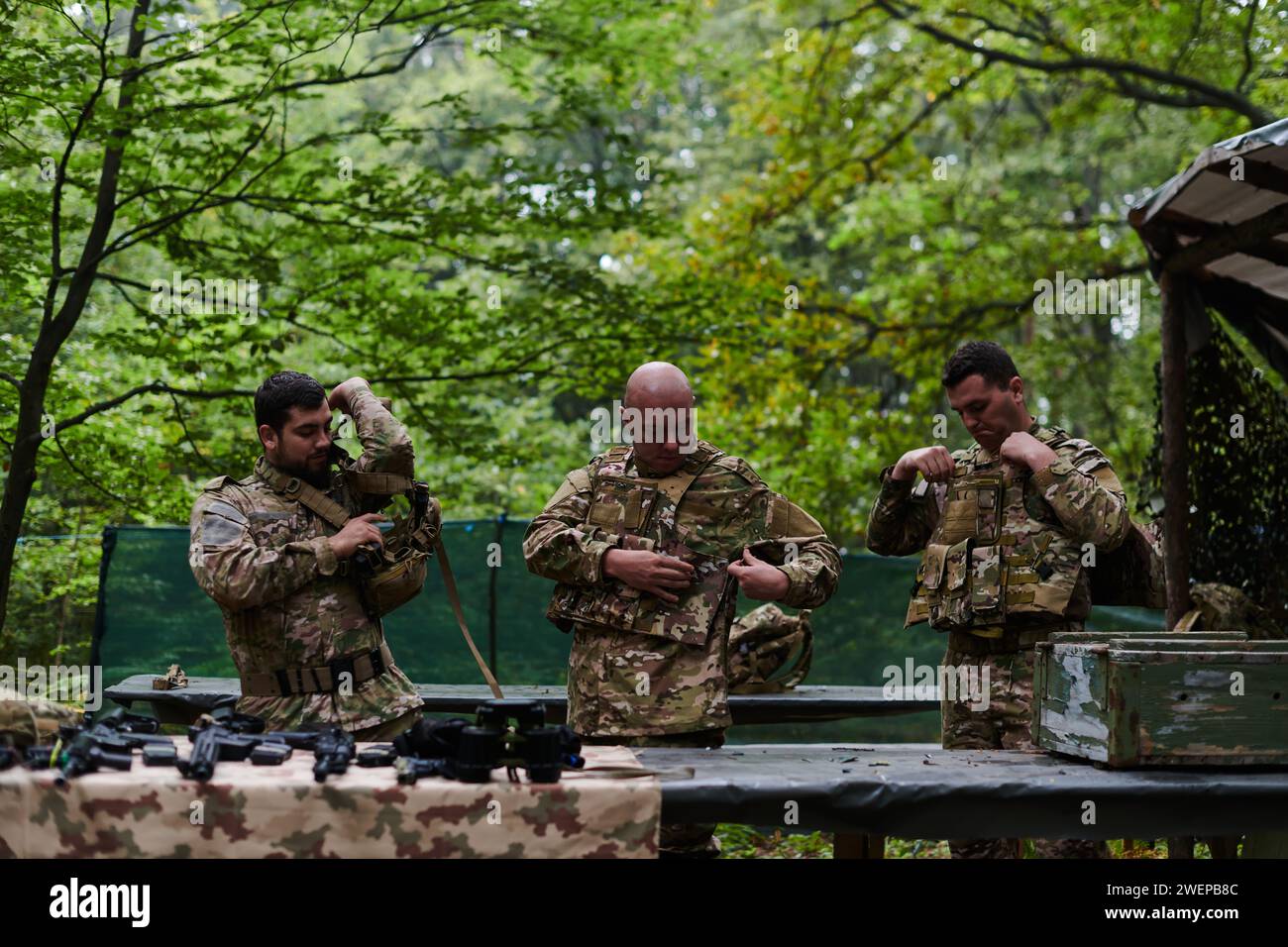 An elite military unit prepares for a hazardous forest operation ...