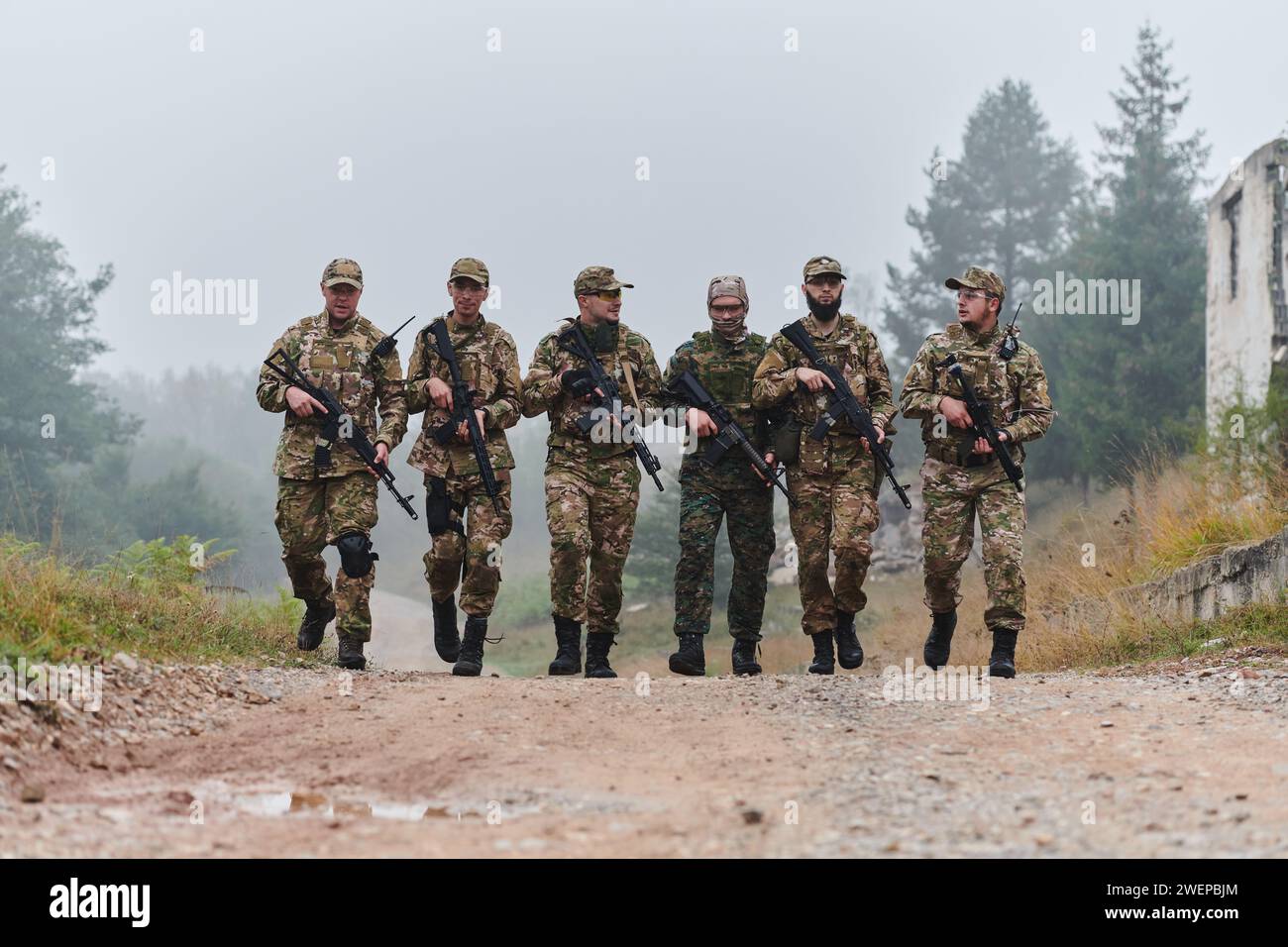 A disciplined and specialized military unit, donned in camouflage ...