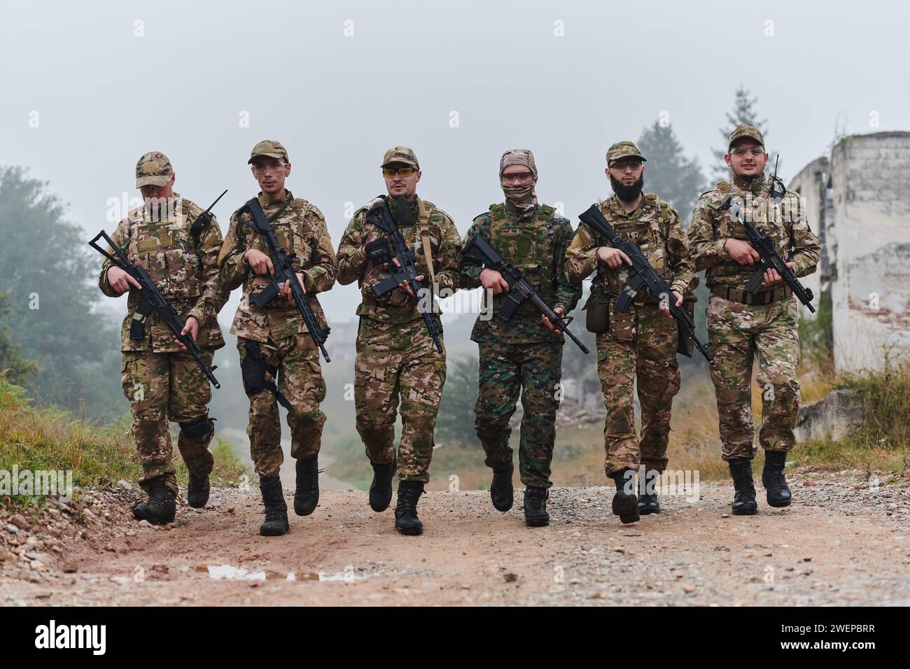 A disciplined and specialized military unit, donned in camouflage ...