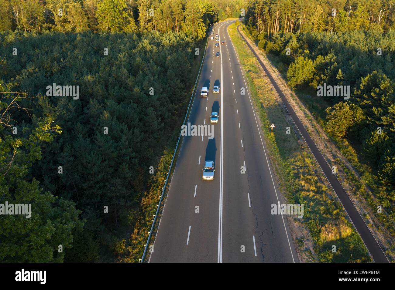 Asphalt road passing cars in hi-res stock photography and images - Alamy