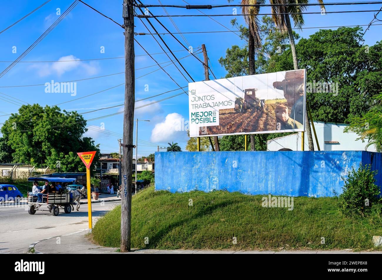 Propanga sign, horse cart, Santa Clara. The sign reads if we work ...