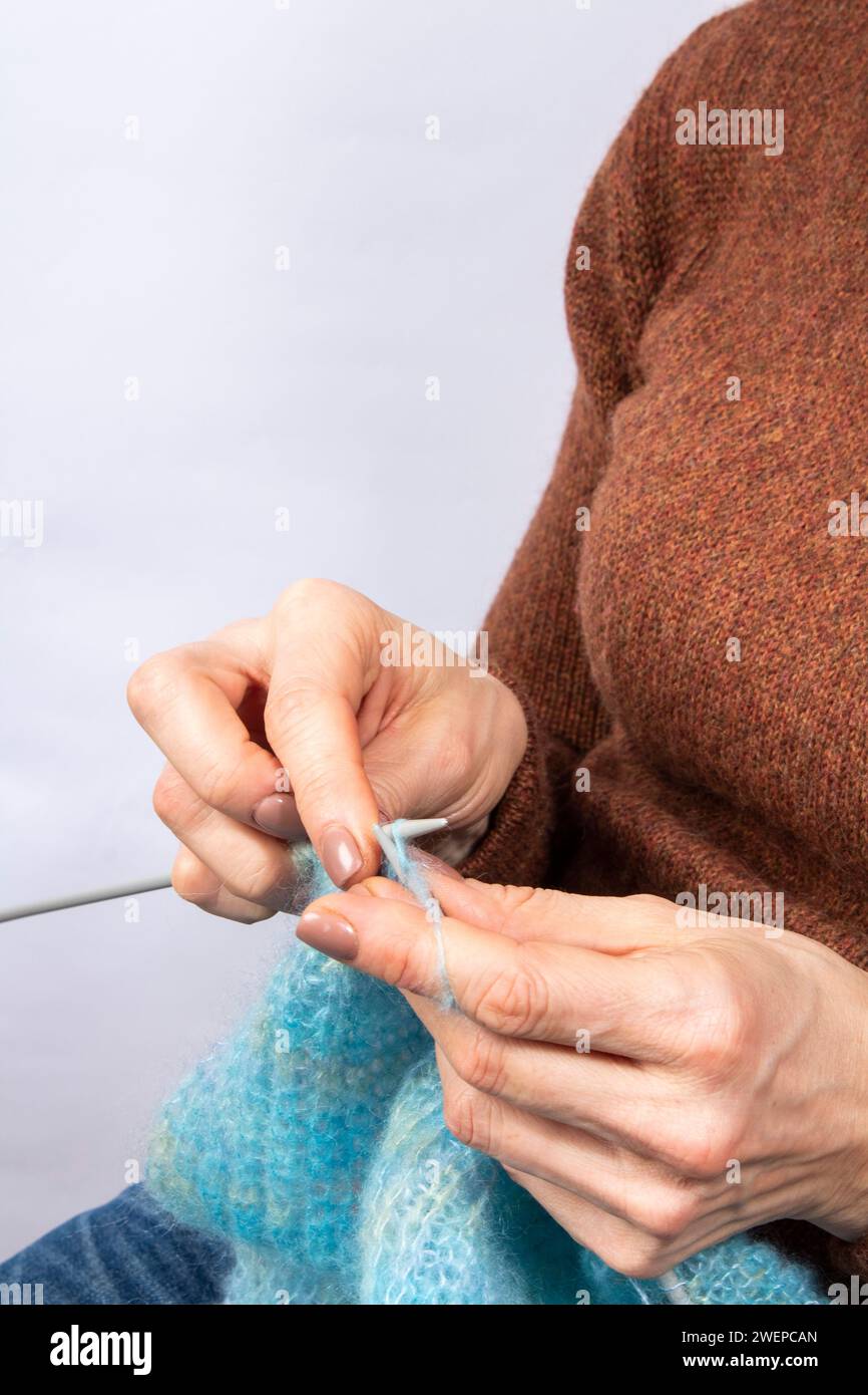 Hands woman knitting sweater close hi-res stock photography and images ...