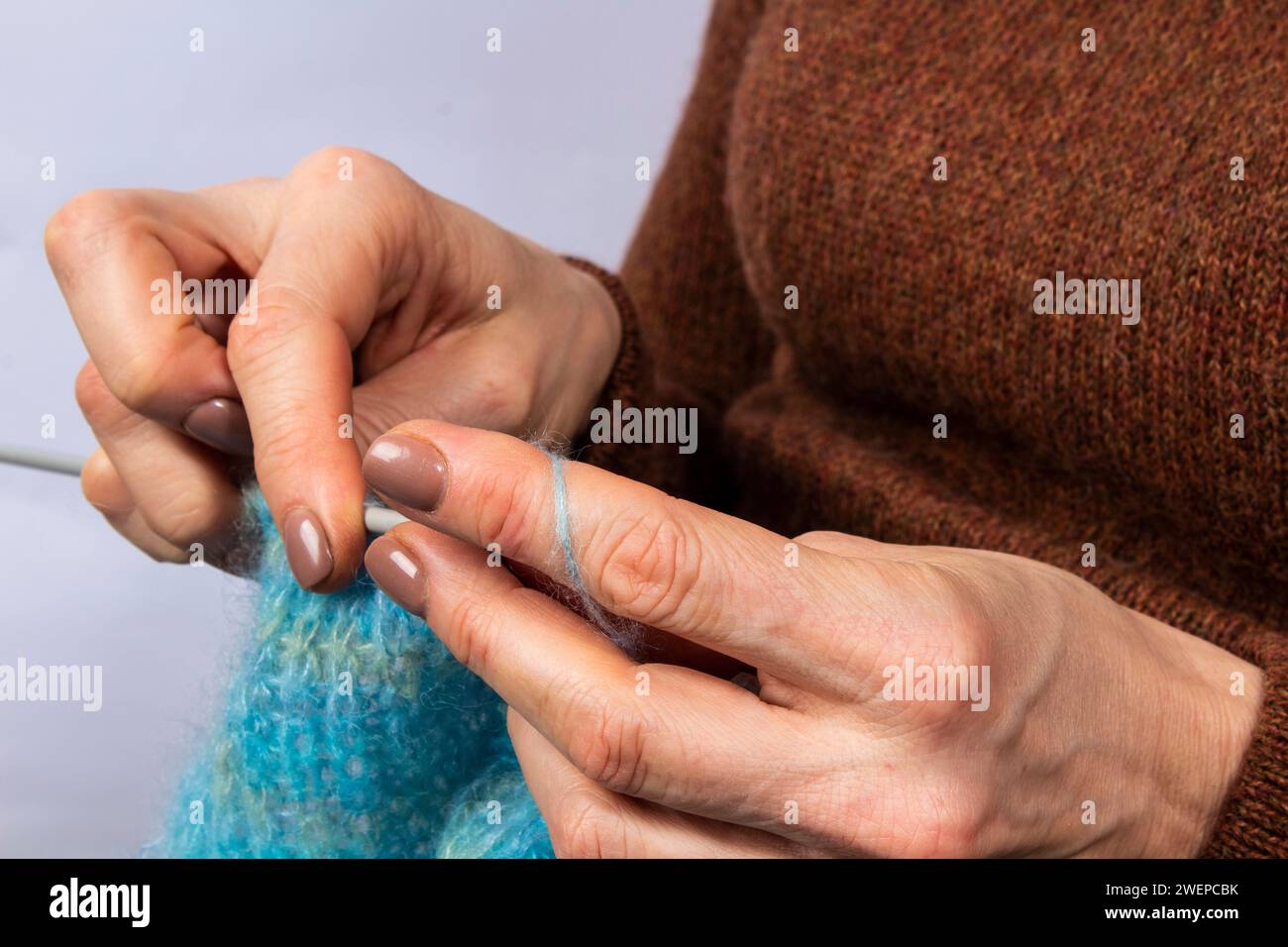 Hands woman knitting sweater close hi-res stock photography and images ...