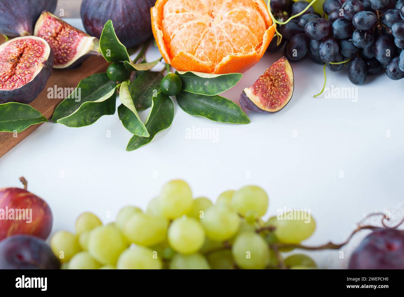 Healthy food on white background. Organic fruit mix frame border Stock ...