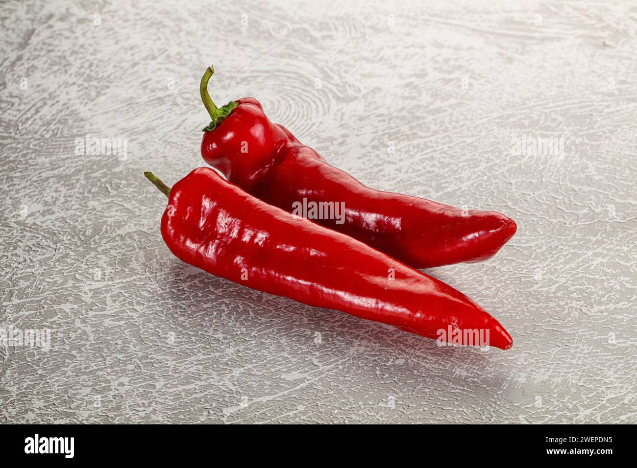 Two red sweet Ramiro organic pepper Stock Photo - Alamy