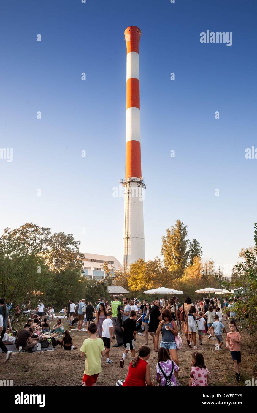 Picture of a chimney releasing pollutants in front of a party made of ...