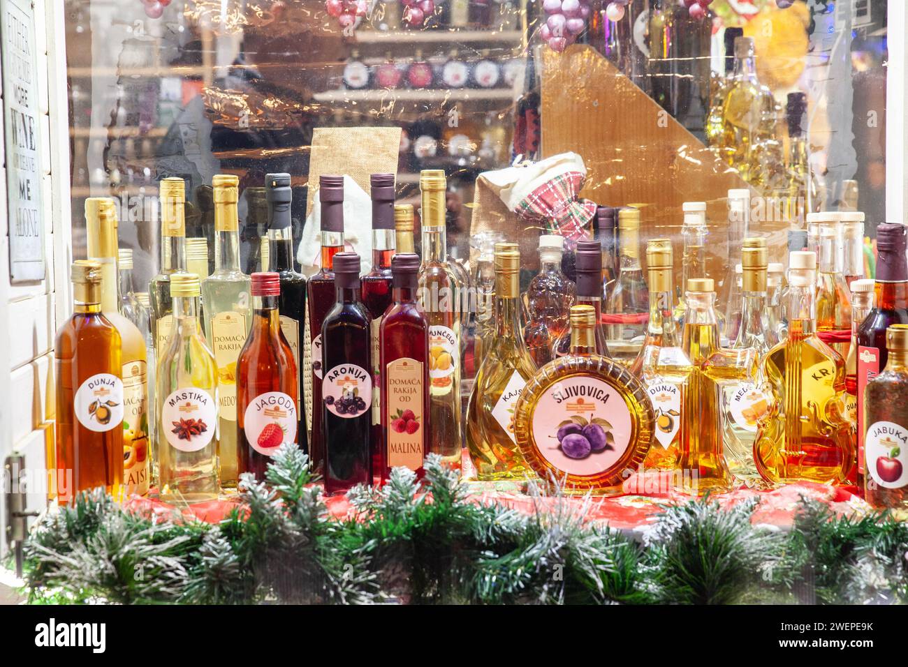 Picture of various rakijas displayed In Belgrade, in a market, in ...