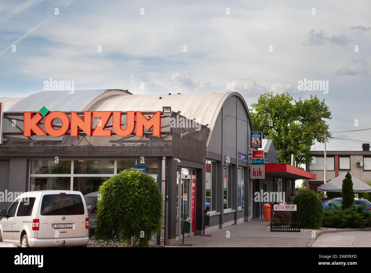 Picture of a sign with the logo of Konzum on their local supermarket in ...