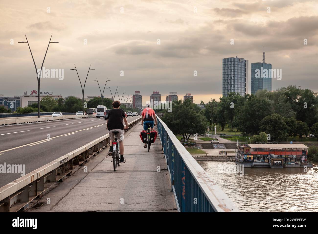 Picture of Branko's bridge during a sunny afternoon with people cycling ...