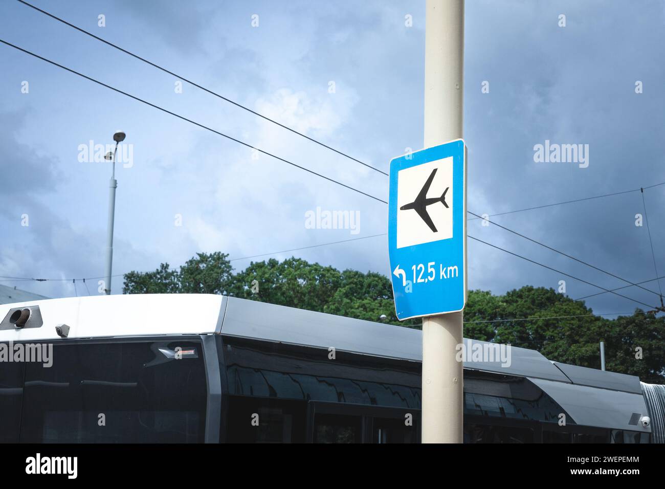 Picture of a sign indicating the direction to Riga Airport (Rigas ...