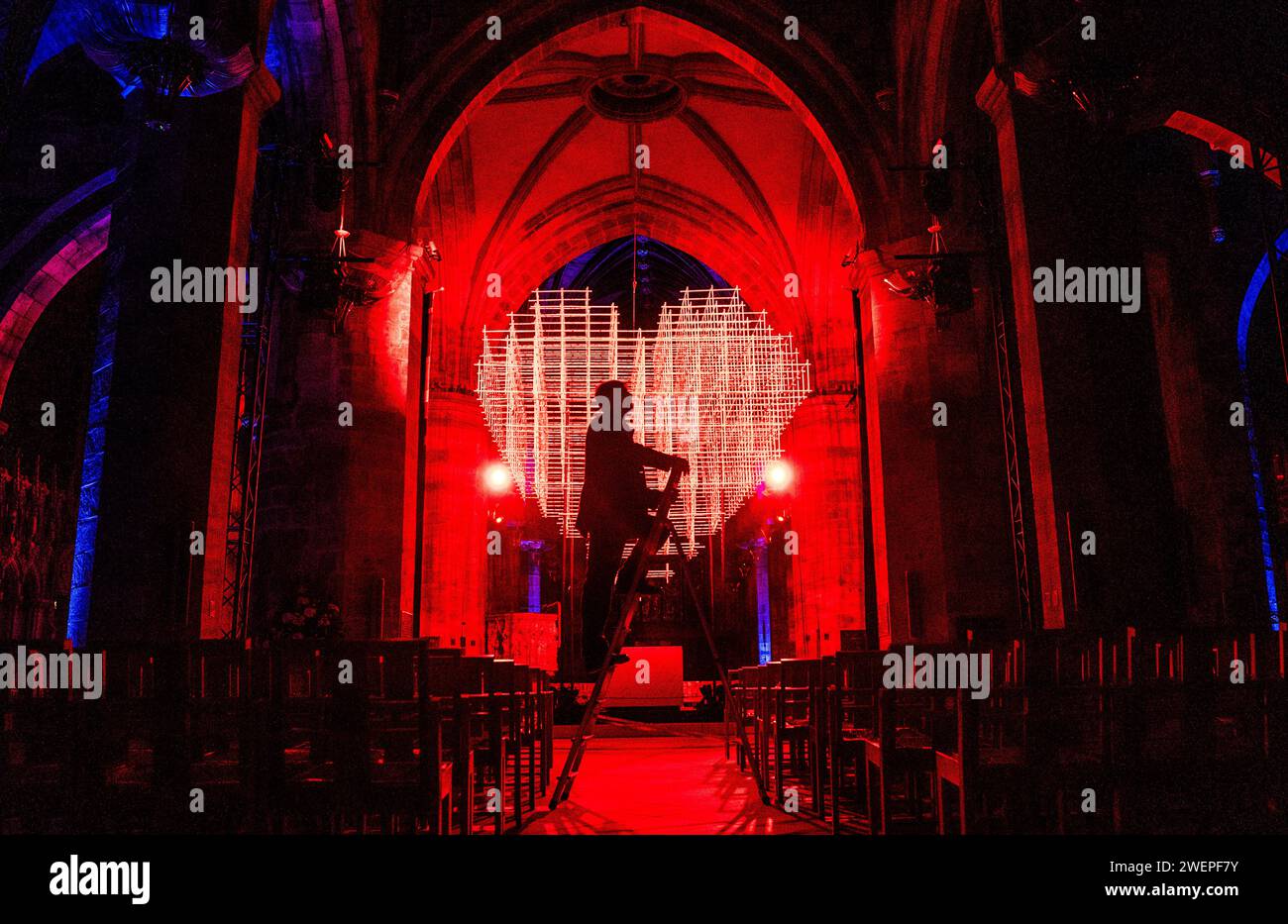 Artist Michael Pendry alongside his three-dimensional sculpture Heart ...