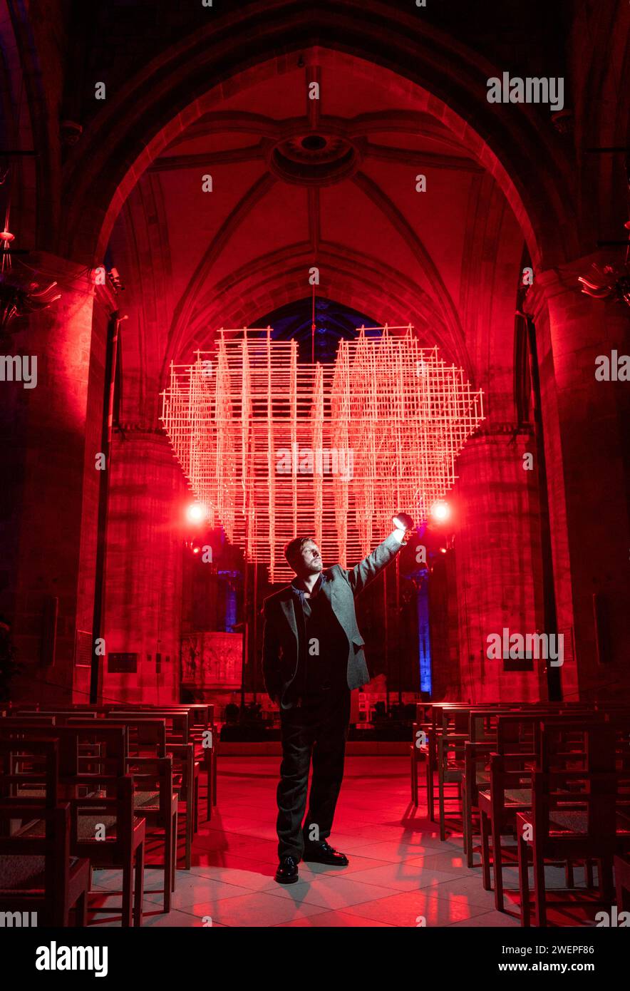 Artist Michael Pendry alongside his three-dimensional sculpture Heart ...