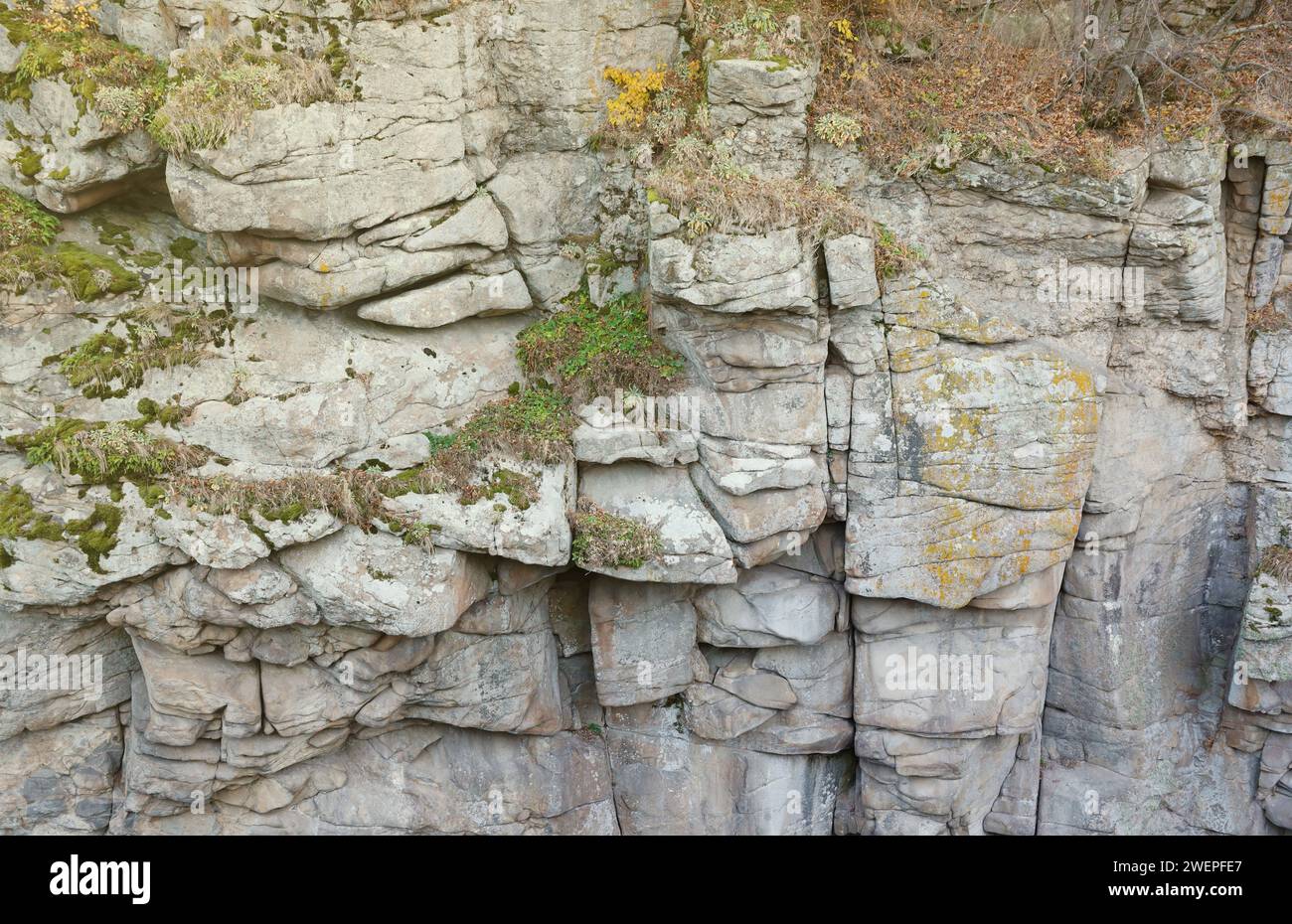 Light coarse natural rock stone background. Mining cliff rough front ...