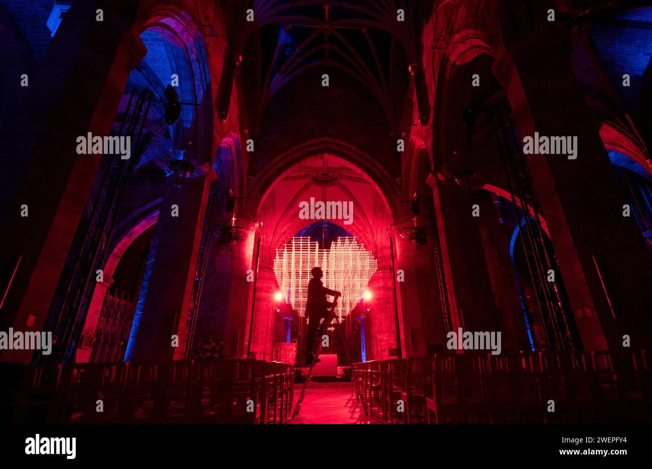 Artist Michael Pendry alongside his three-dimensional sculpture Heart ...