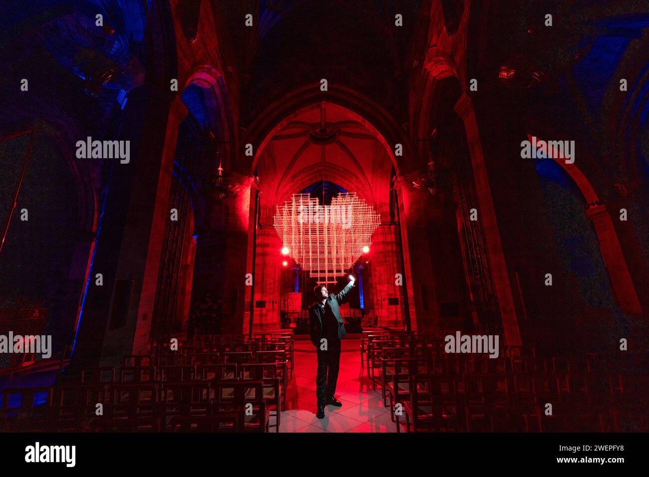 Artist Michael Pendry alongside his three-dimensional sculpture Heart ...