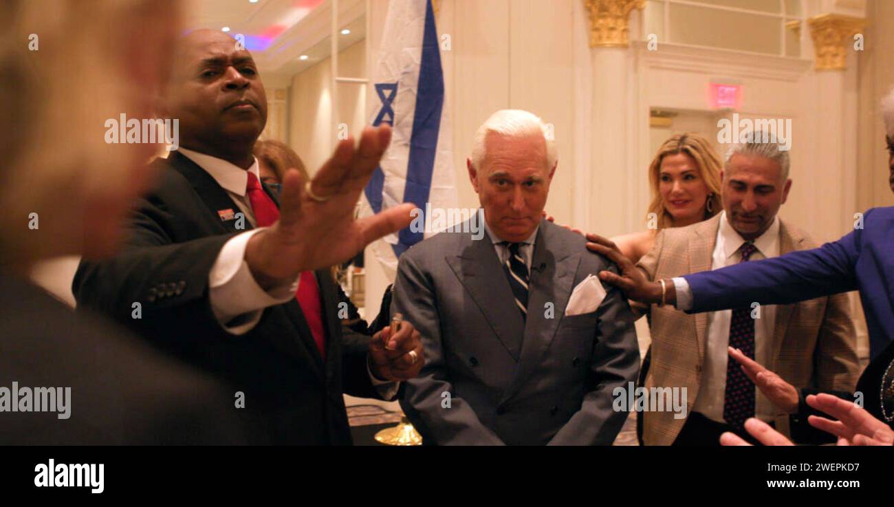 A STORM FORETOLD, Roger Stone (center), 2023. ph: Christopher ...