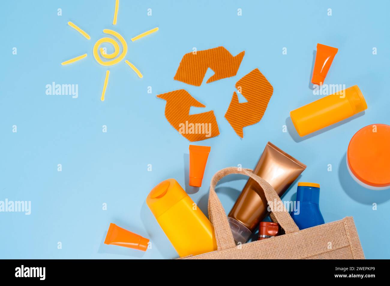 Collection sunscreen skincare products on a blue background. Plastic ...