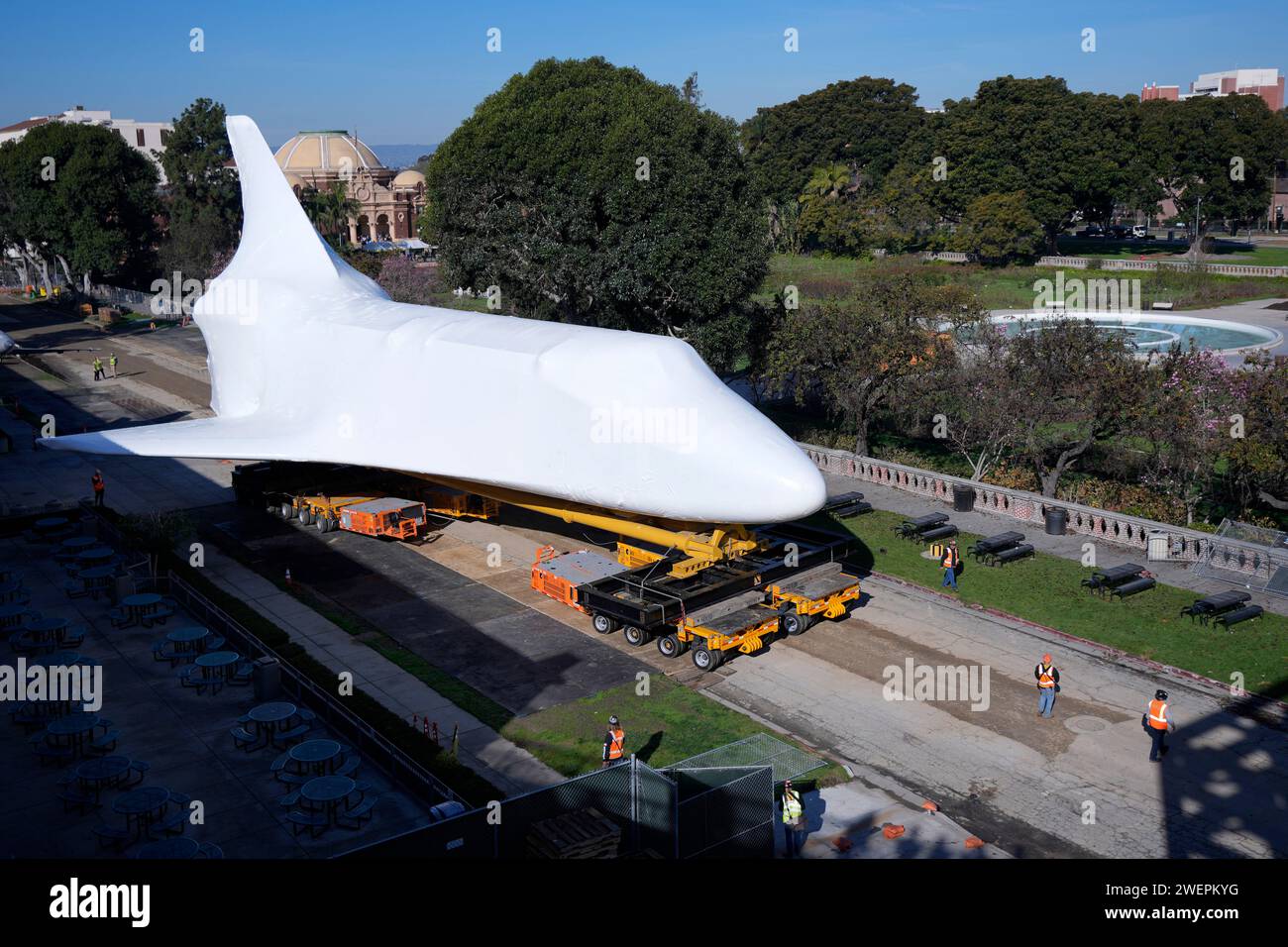 The retired NASA space shuttle Endeavor is moved on the grounds of the ...