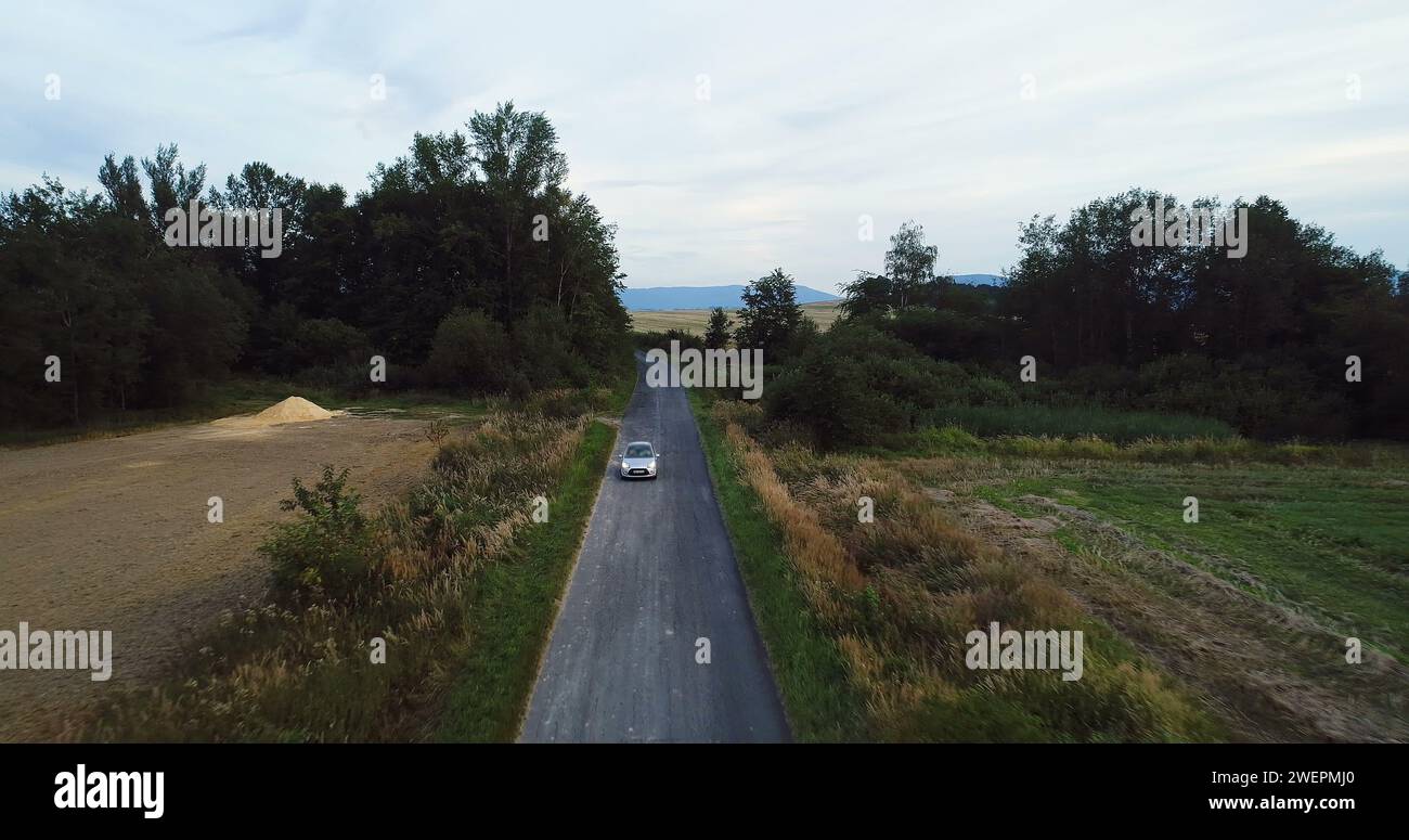 Car passing highway aerial view Stock Photo - Alamy