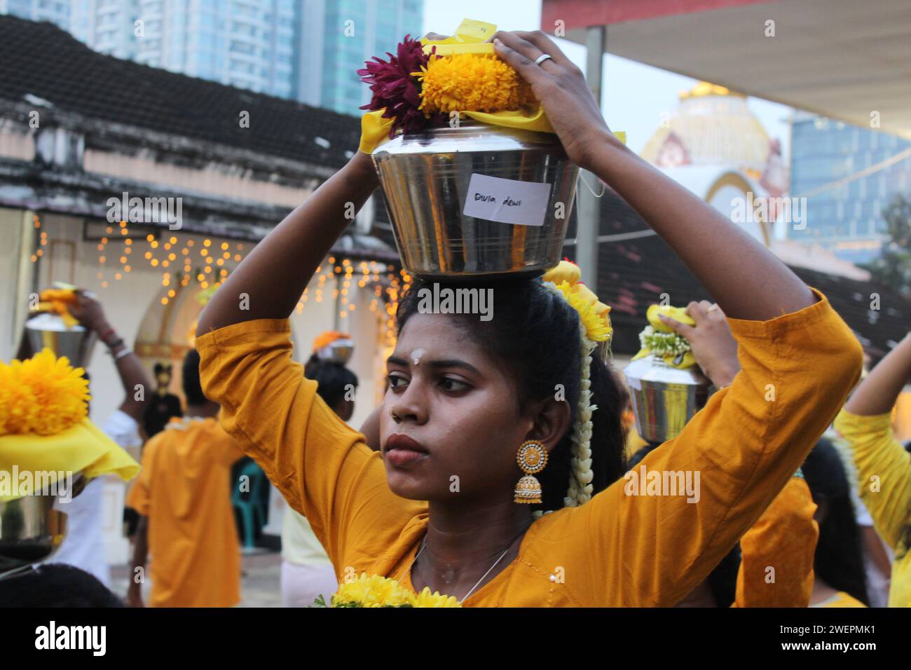 A woman of Indian descent, Tamil, celebrates the Thaipusam festival by ...