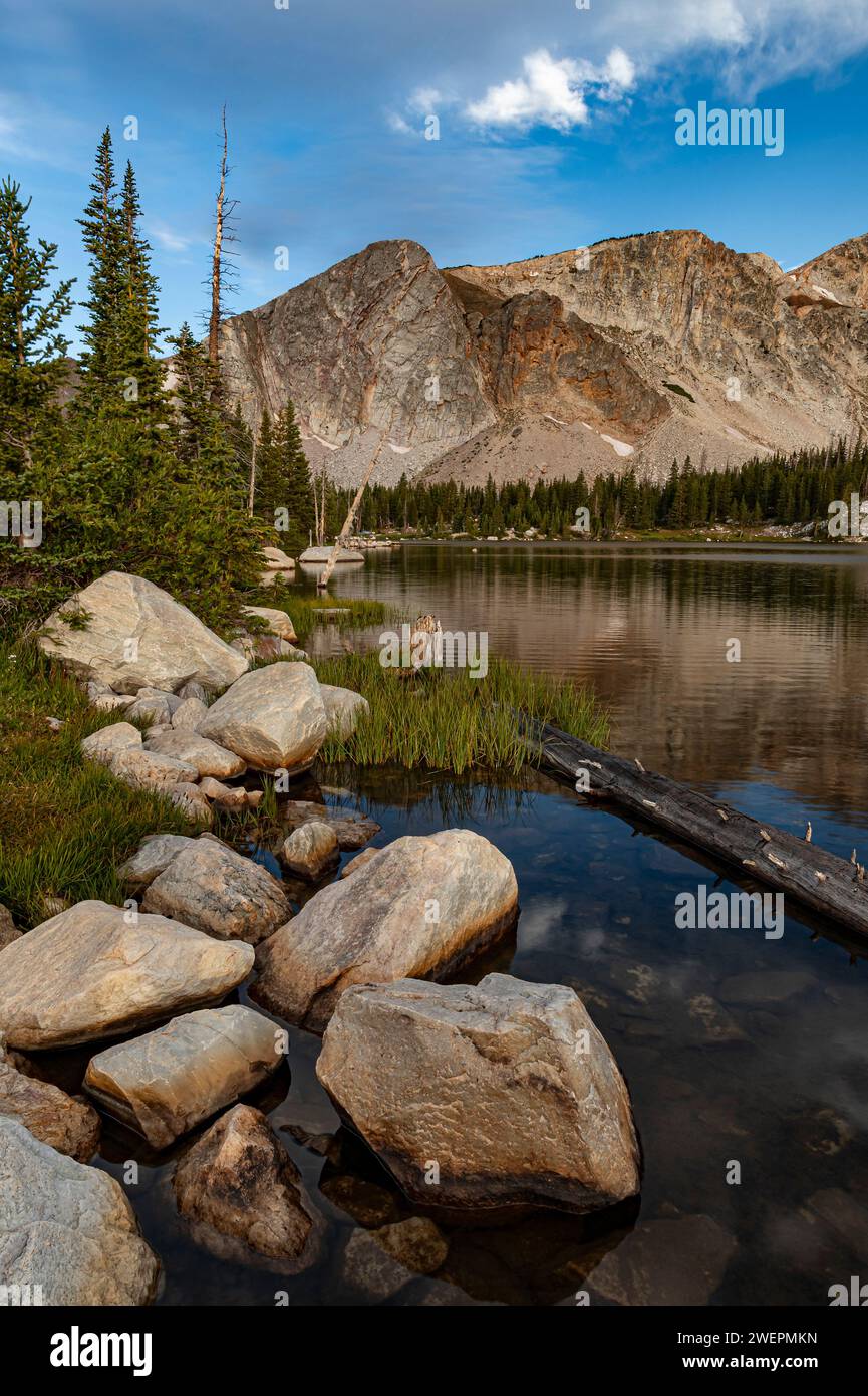 A mountain is reflected in the waters of Mirrow Lake, Snowy Mountains ...
