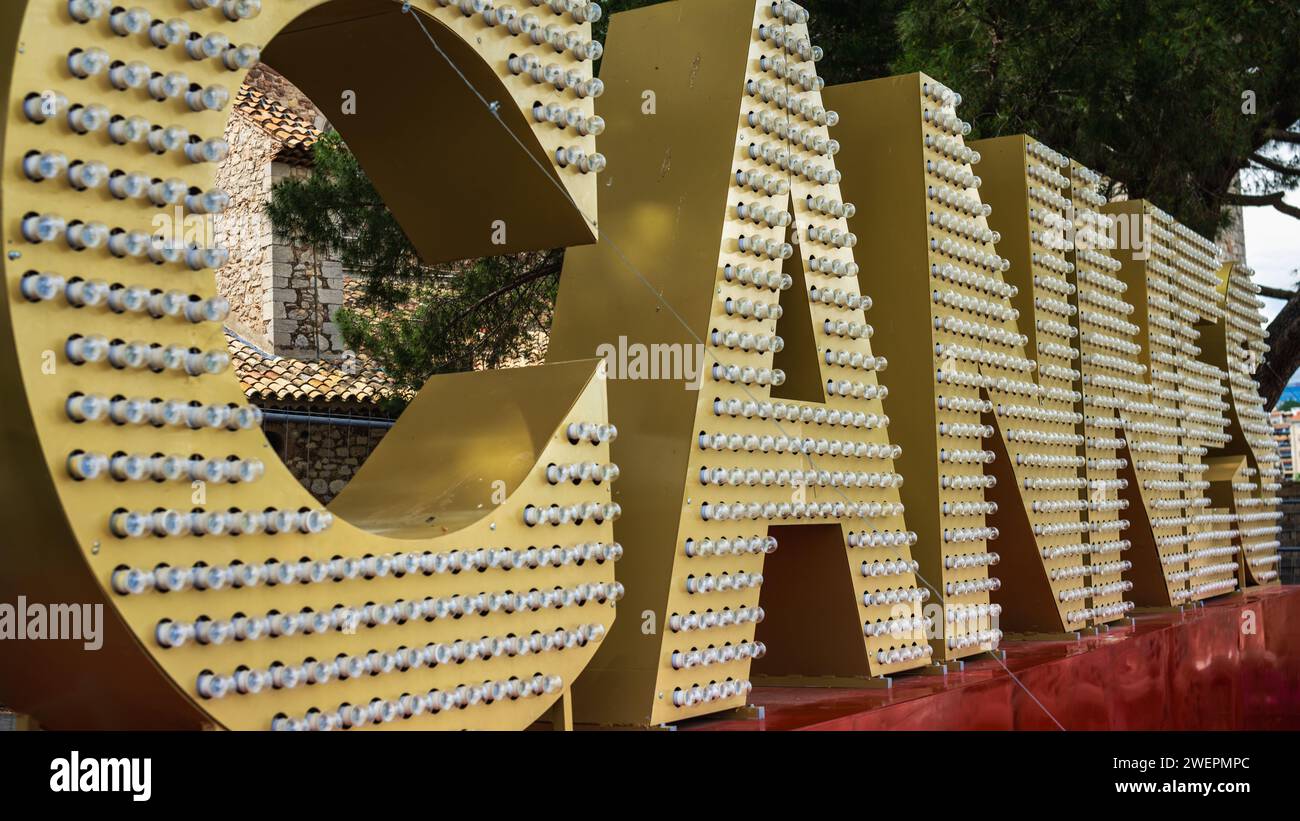 Sign Cannes written with light bulbs. Cannes French Riviera on Cote d ...