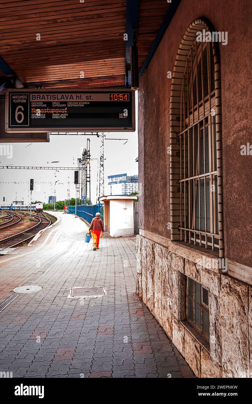 Inside the Bratislava train station, a train board indicates the ...