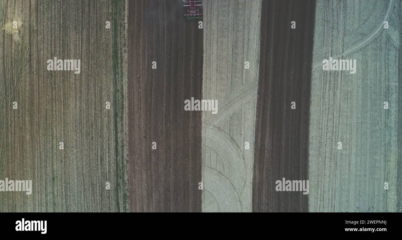 aerial view of tractor sowing field Stock Photo - Alamy