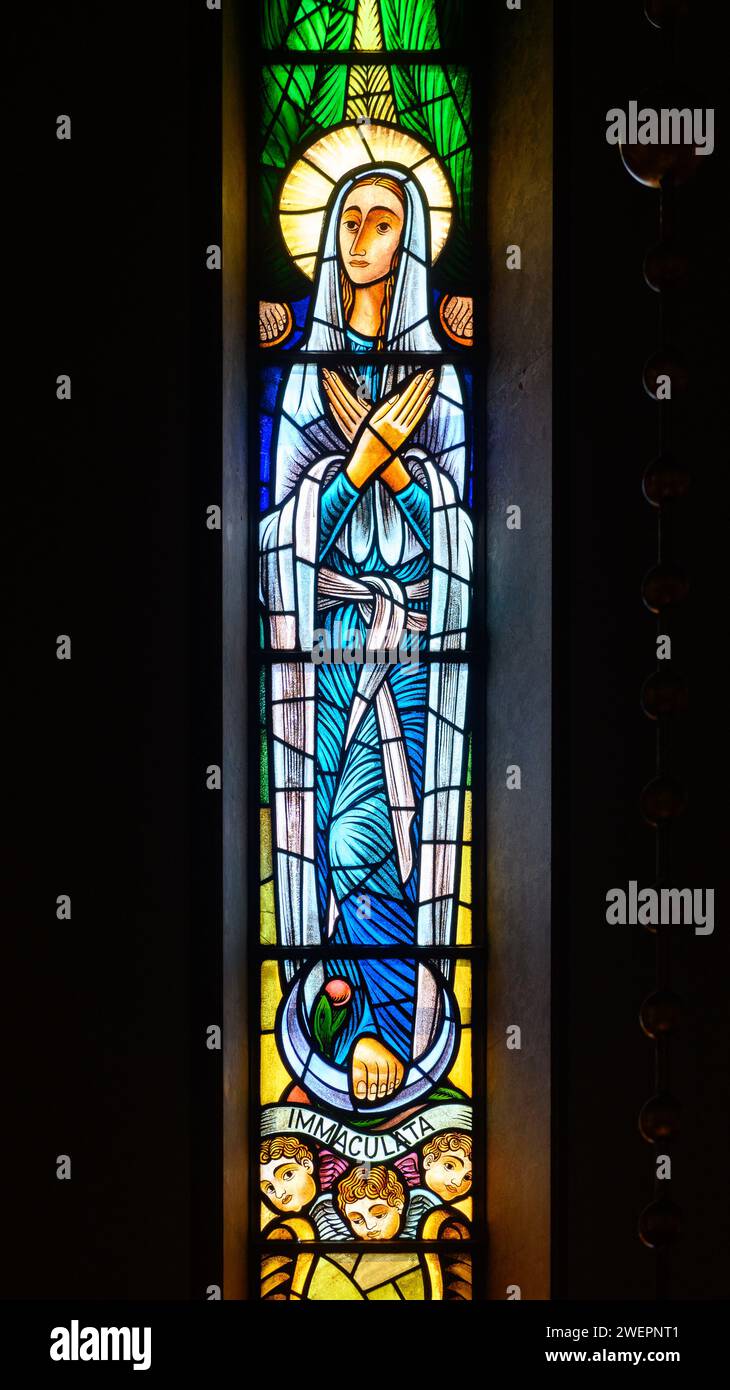 Immaculata – a title of the Virgin Mary. A stained-glass window in ...