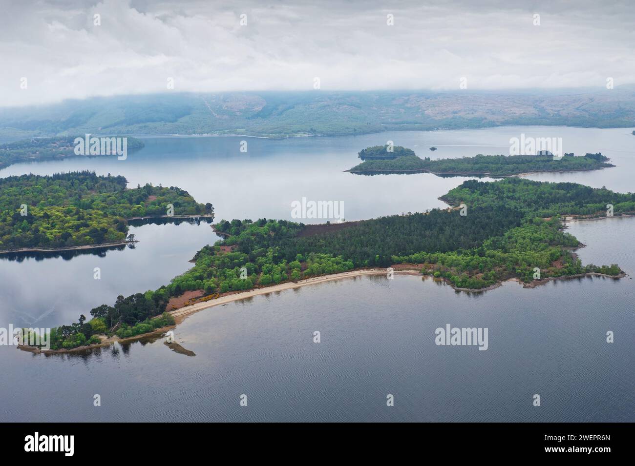 Loch Lomond aerial view showing islands Inchtavannach, Inchconnachan ...