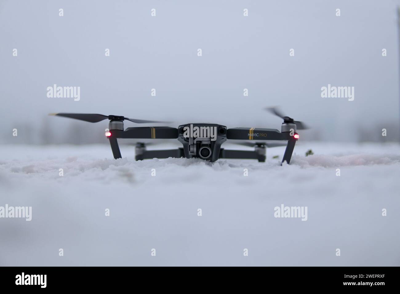Drone Ready for Takeoff on Snowy Ground in Winter Landscape Stock Photo ...