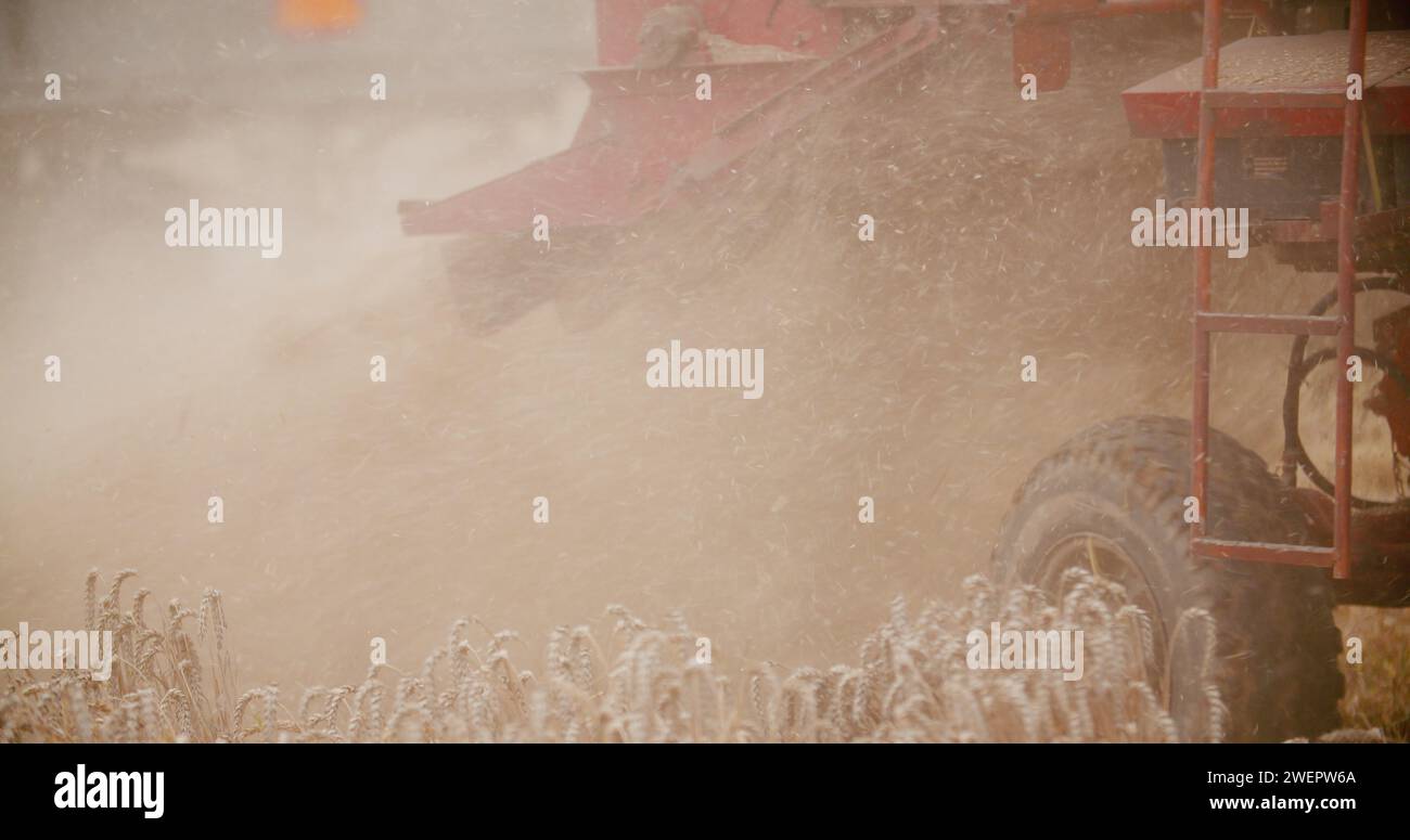 Close-up of combine harvester on field at farm Stock Photo - Alamy