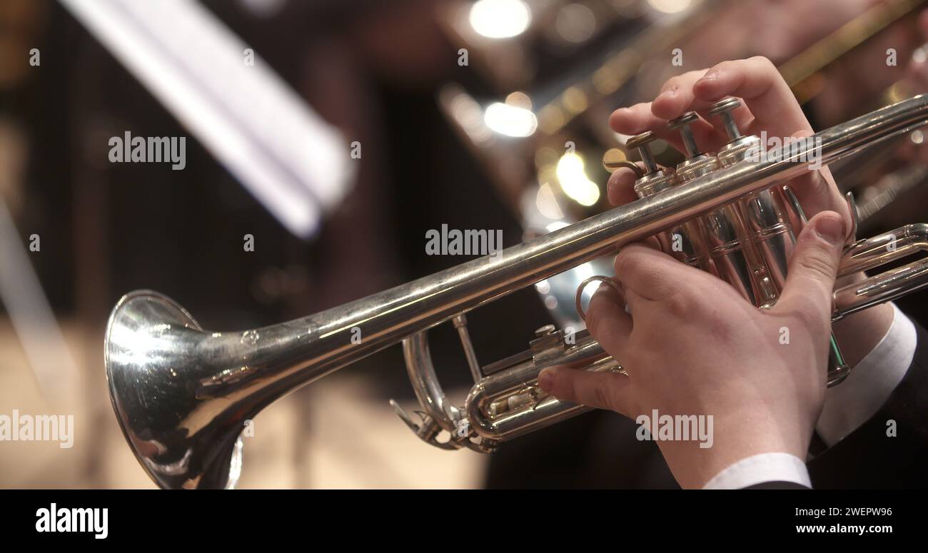 musician playing trumpet at concert Stock Photo - Alamy