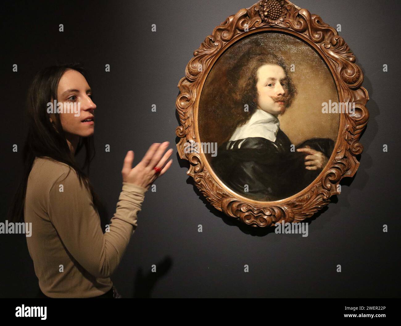 New York, New York, USA. 26th Jan, 2024. A woman looks at a Van Dyck ...