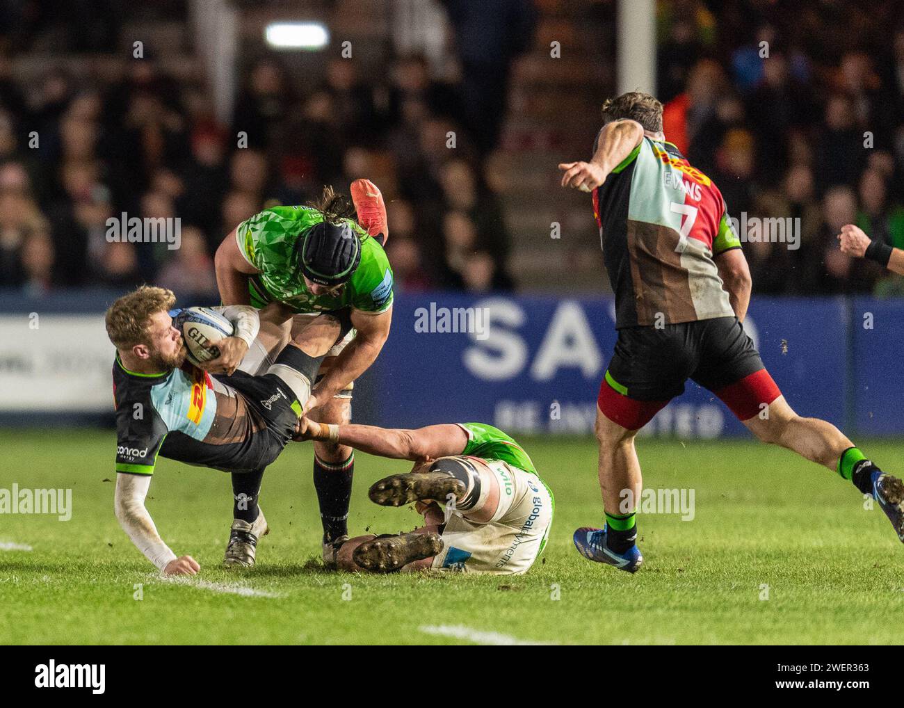 Tyrone Green of Harlequins is upended by Kyle Hatherell of Leicester ...