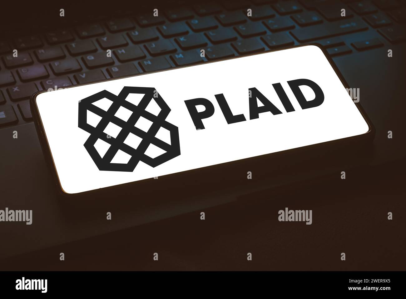 In this photo illustration, the Plaid Inc. logo is displayed on a smartphone screen Stock Photo ...