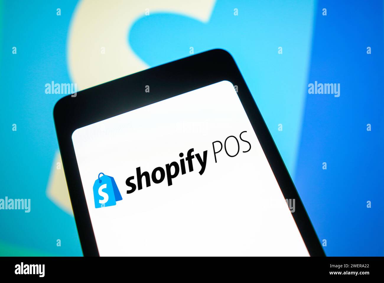 In this photo illustration, the Shopify POS logo is displayed on a ...
