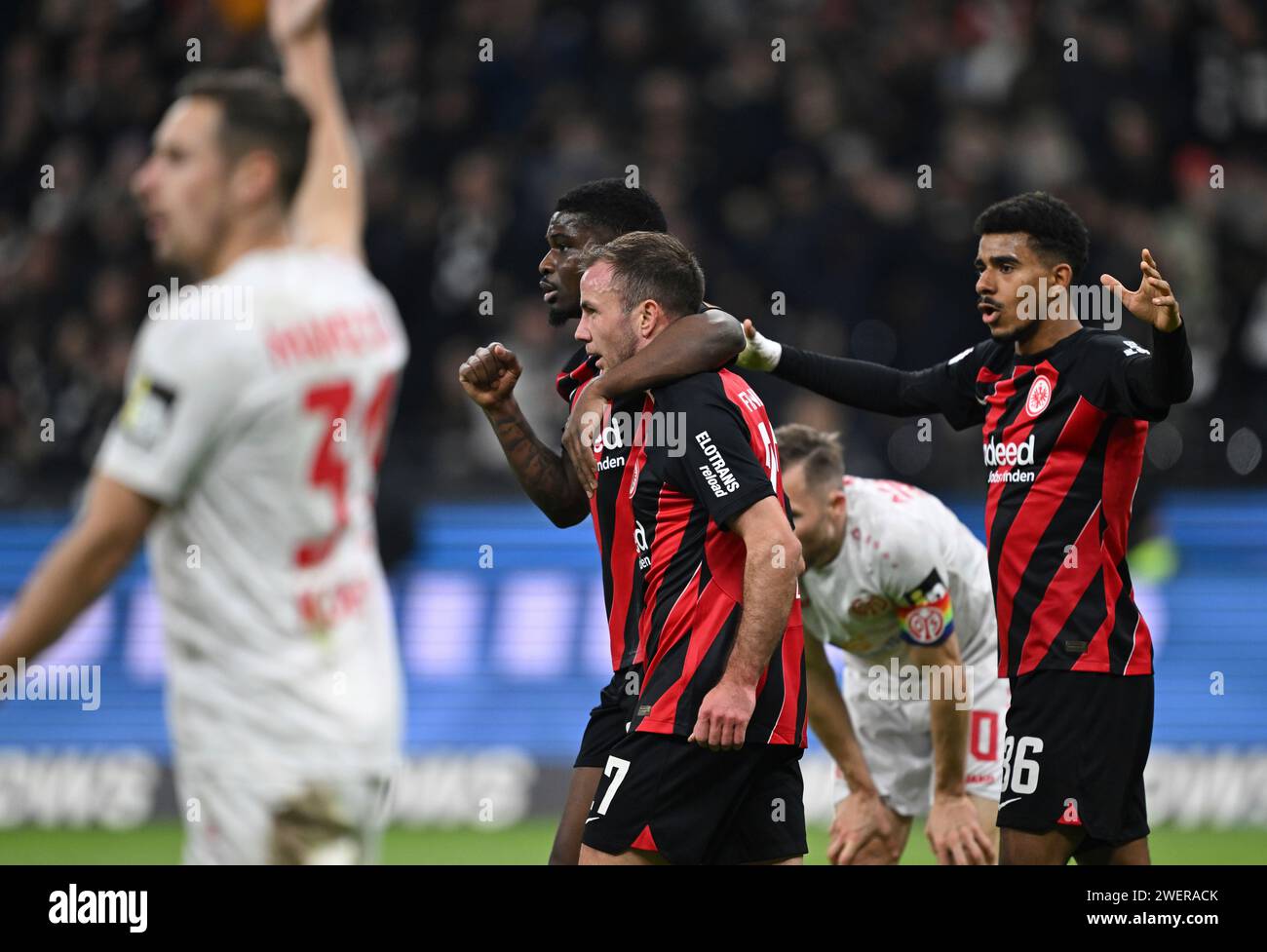 Frankfurt's Mario Gotze, centre, celebrates with Eric Junior Dina ...
