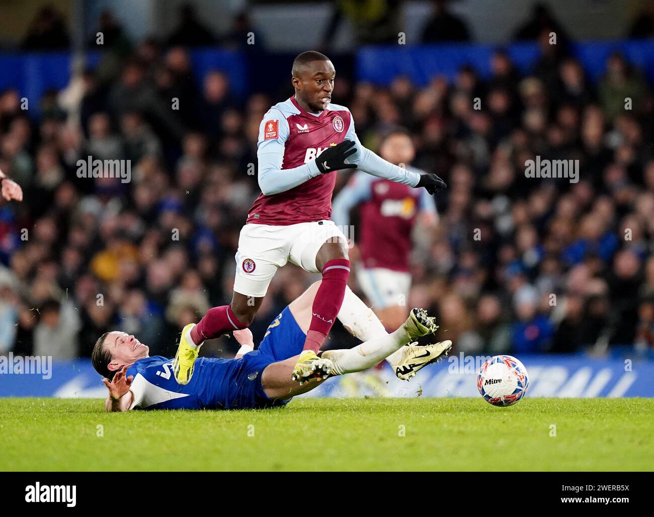 Aston Villa's Moussa Diaby (right) evades a tackle from Chelsea's Conor ...