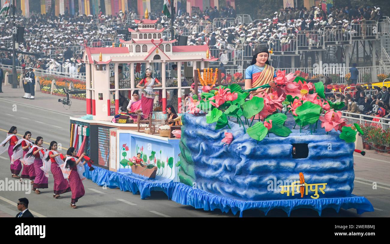 NEW DELHI, INDIA - JANUARY 26: Artists perform beside the tableaux of Manipur state during the ...