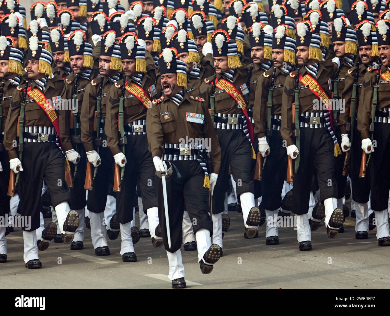 NEW DELHI, INDIA - JANUARY 26: A contingent of the Grenadier Regiment marches past the saluting ...