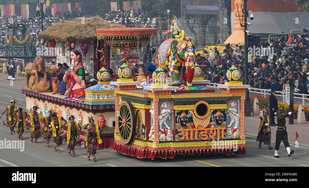 NEW DELHI, INDIA - JANUARY 26: Artists perform beside the tableaux of Odisha state during the ...