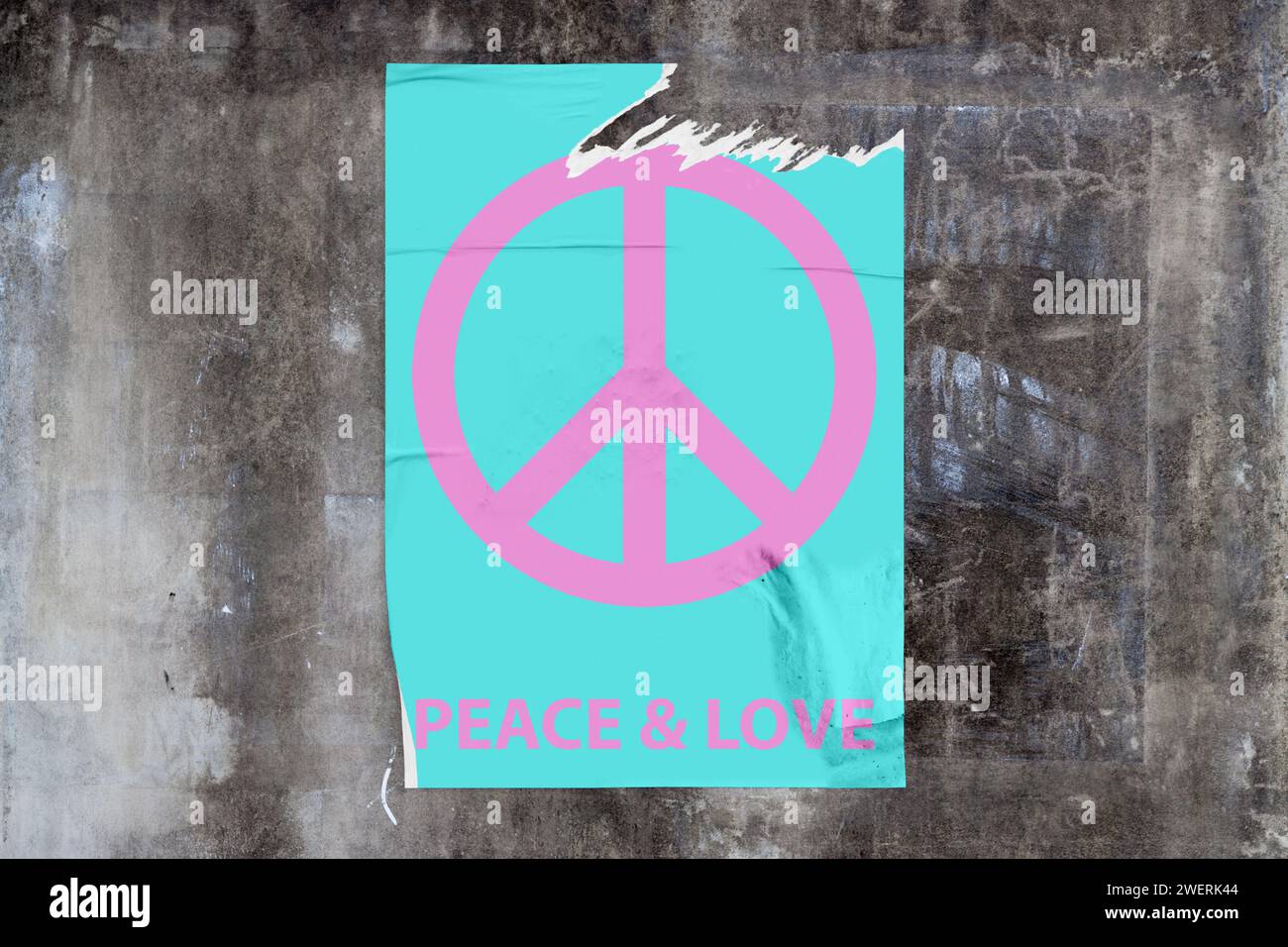 Full-frame weathered concrete wall with a torn cyan poster in the ...